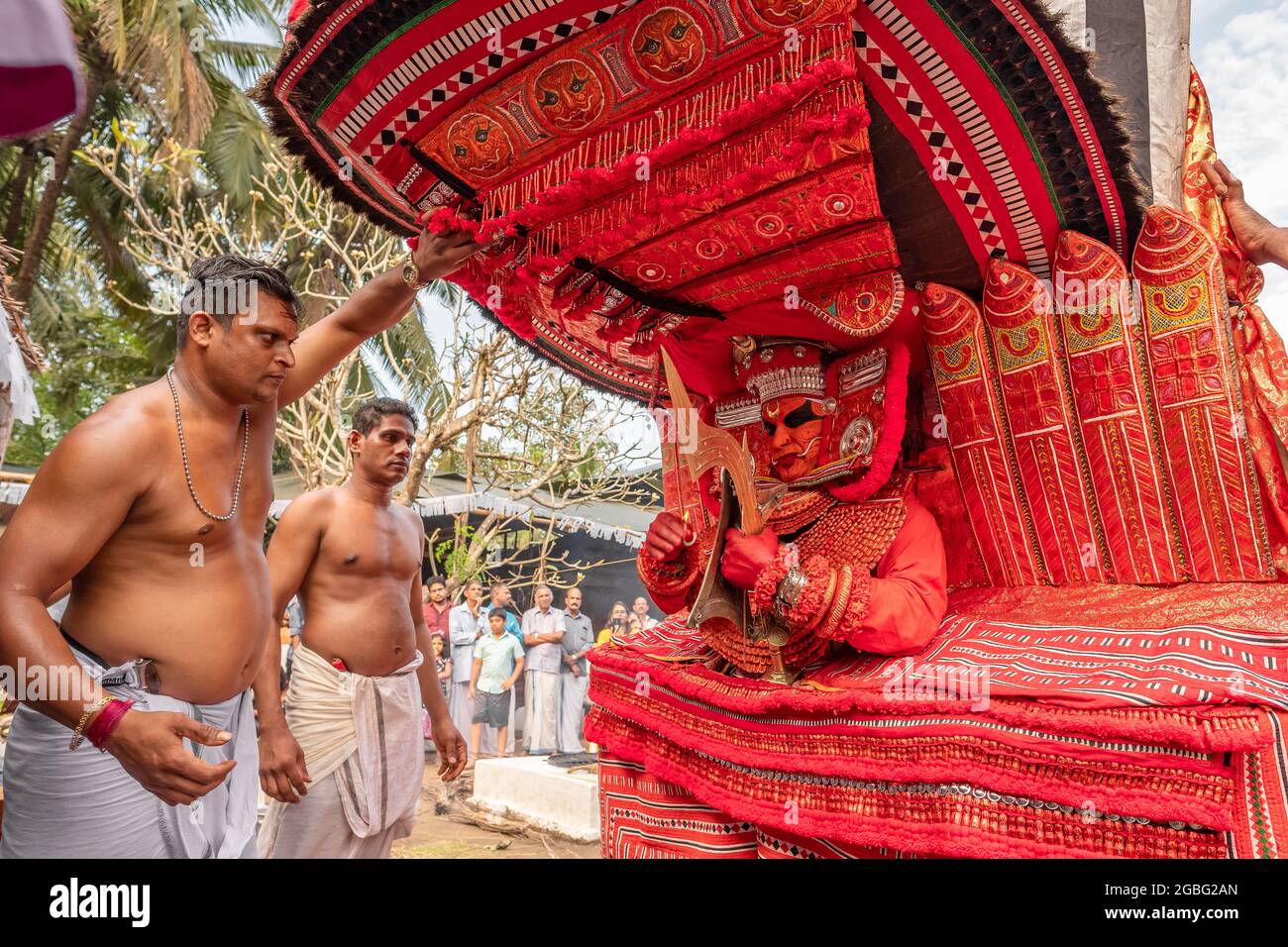 Theyyam artist perform during temple festival in Payyanur, Kerala ...