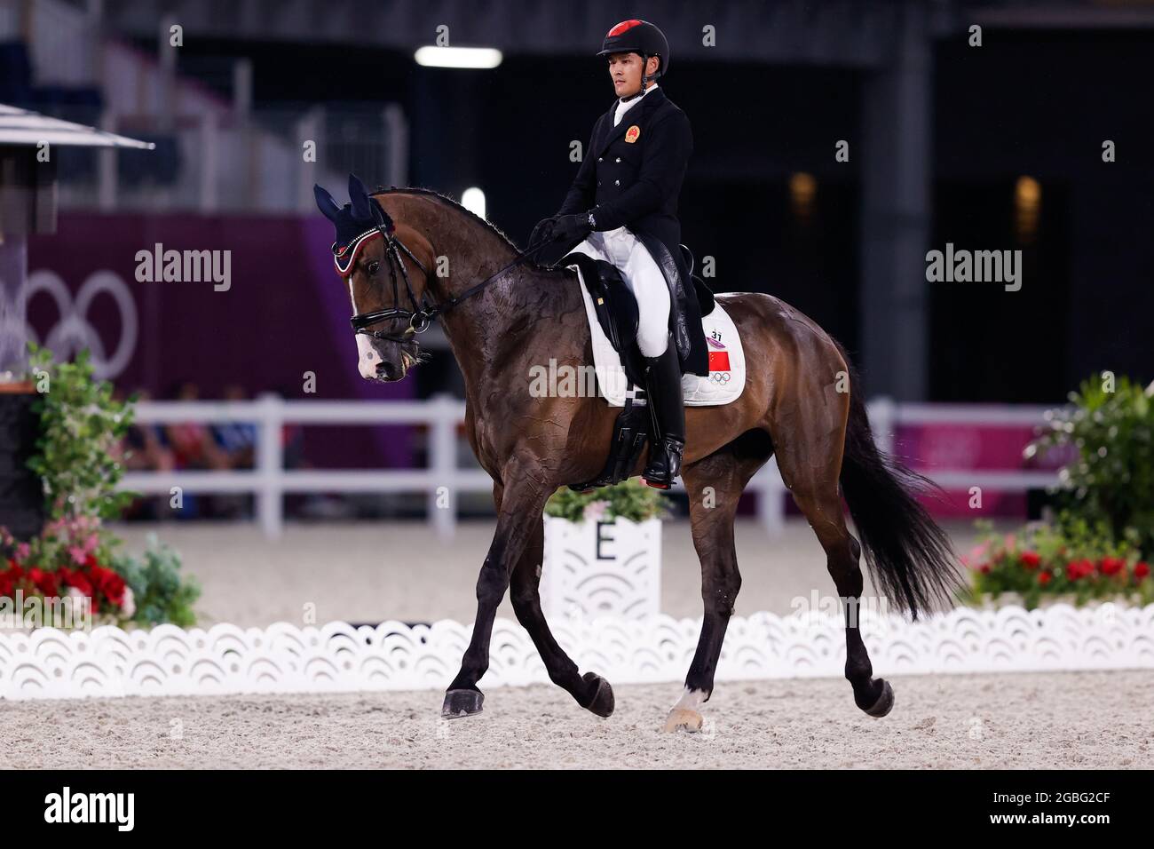 TOKYO, JAPAN - JULY 30: Huadong Sun of China competing on Eventing ...