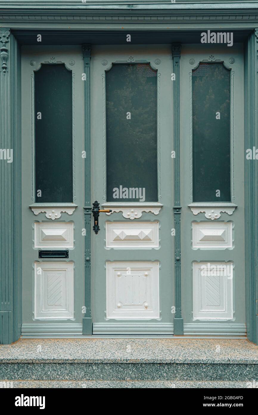 Vertical shot of modern green-white door Stock Photo - Alamy Vertical shot of modern green-white door Stock Photo - Alamy