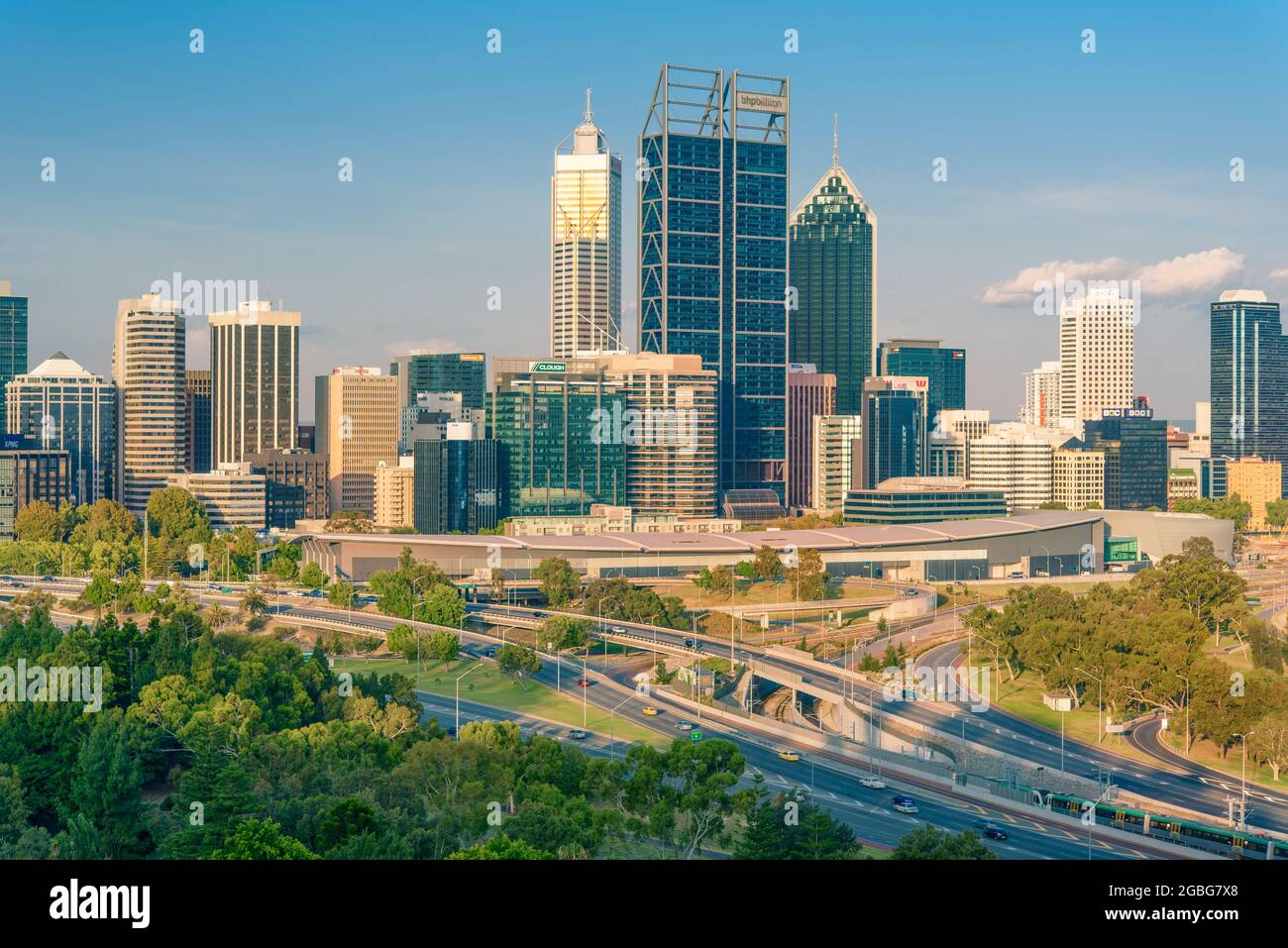 Late afternoon view of Perth city skyscrapers and Mitchell Freeway seen ...
