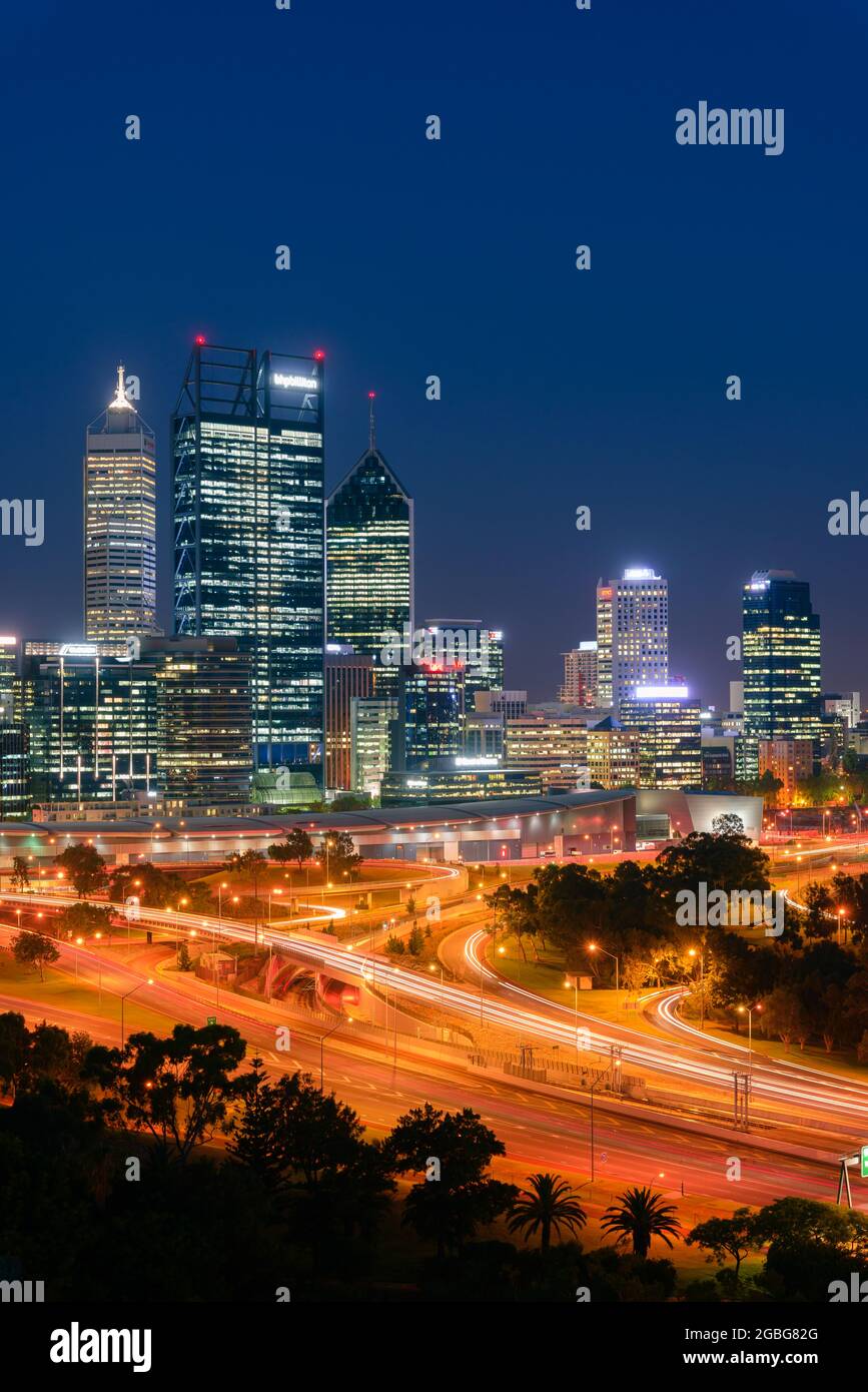 Evening view of Perth city skyscrapers and Mitchell Freeway seen from ...