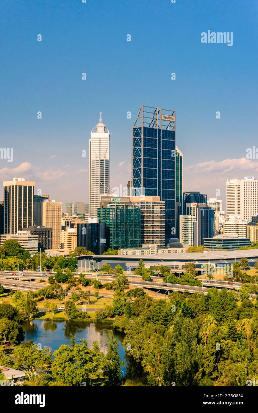 Late afternoon view of Perth city skyscrapers and Mitchell Freeway seen ...