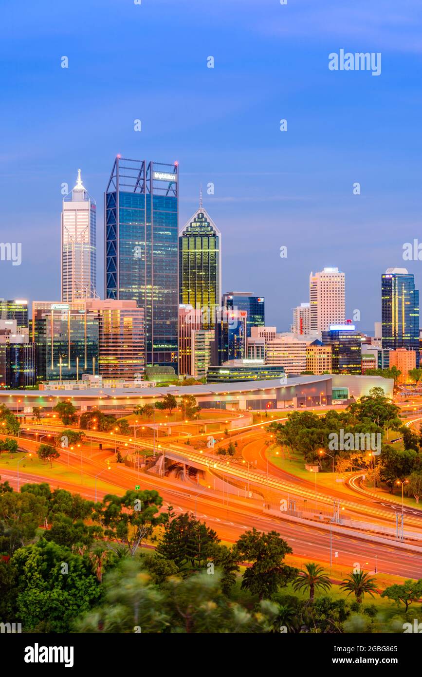 Evening view of Perth city skyscrapers and Mitchell Freeway seen from ...