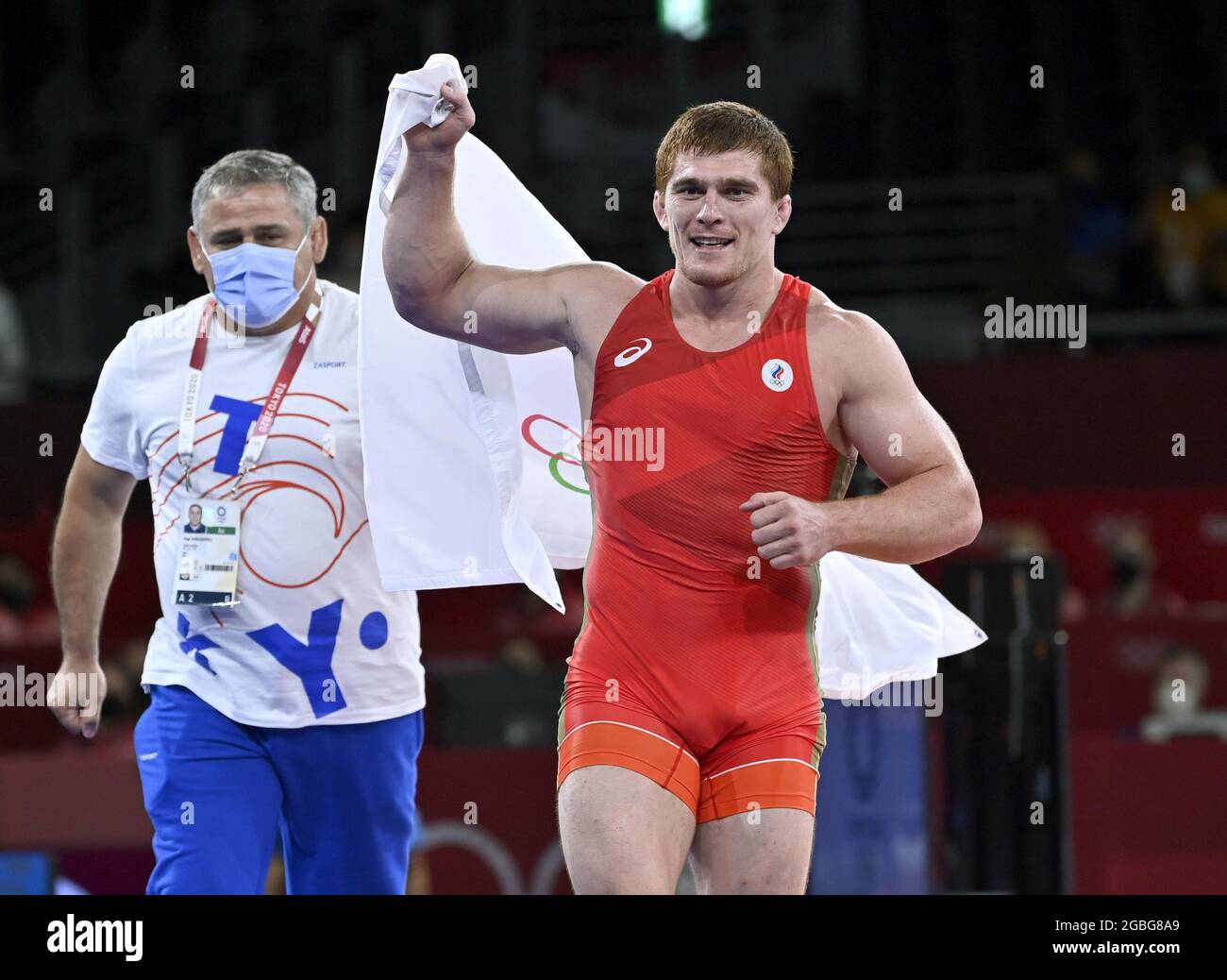 Musa Evloev of the Russian Olympic Committee celebrates after winning ...