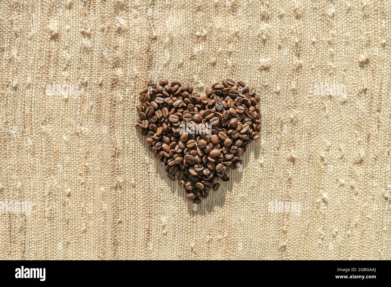 Coffee beans top flat view of heart shaped cafe background coffee lover ...