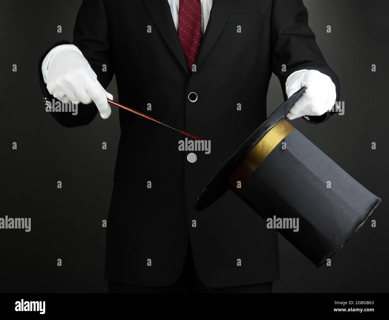 magician performance on dark background Stock Photo - Alamy