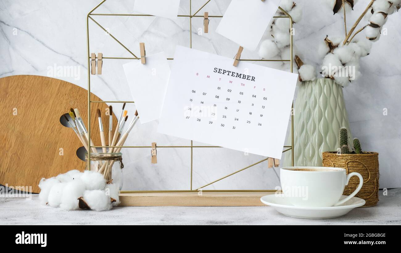 SEPTEMBER CALENDAR cards and posters mock ups on grid board. Copy space ...