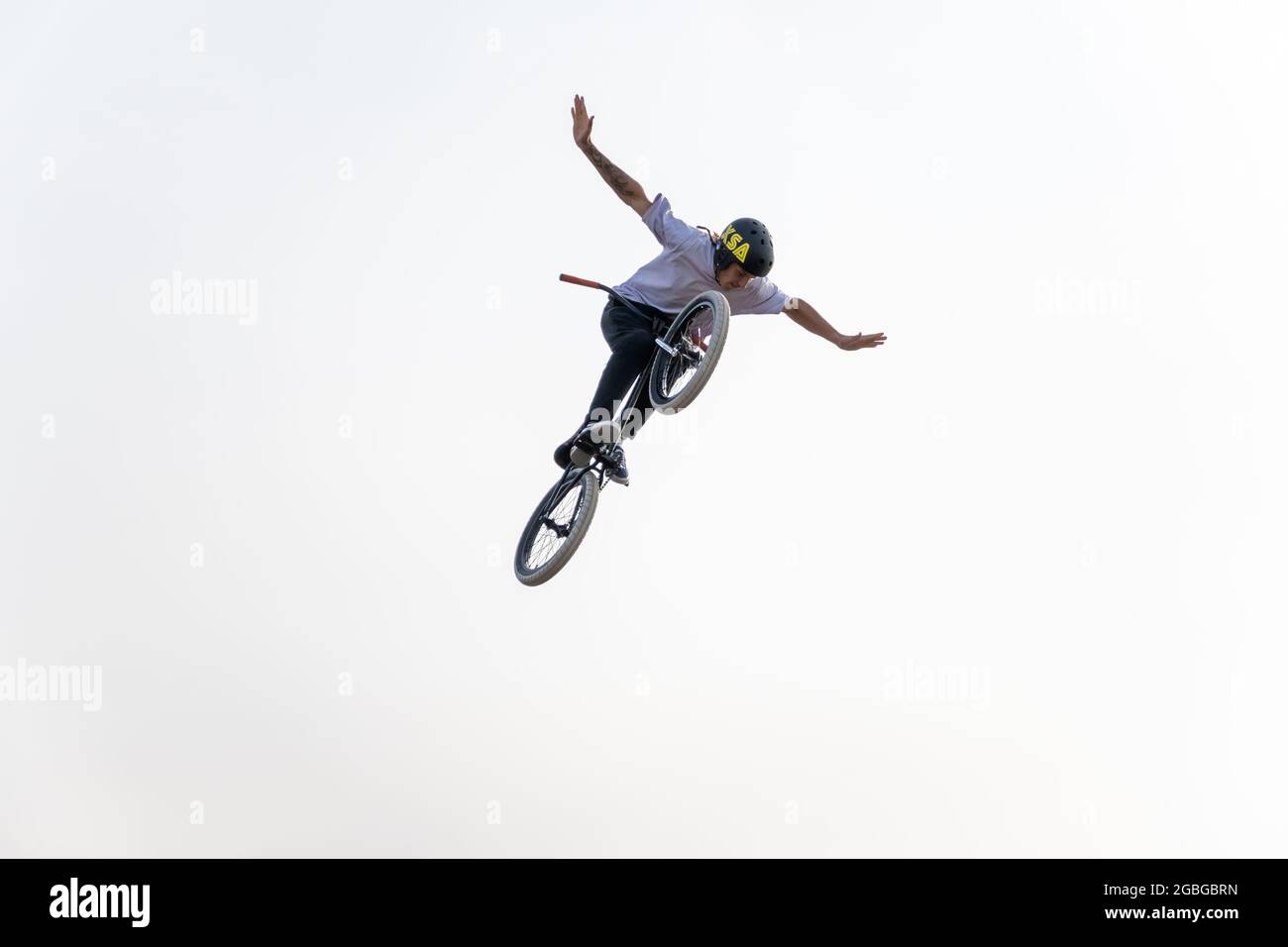 Kazan, Russia - September 26, 2020: A young rider on a BMX bike does ...