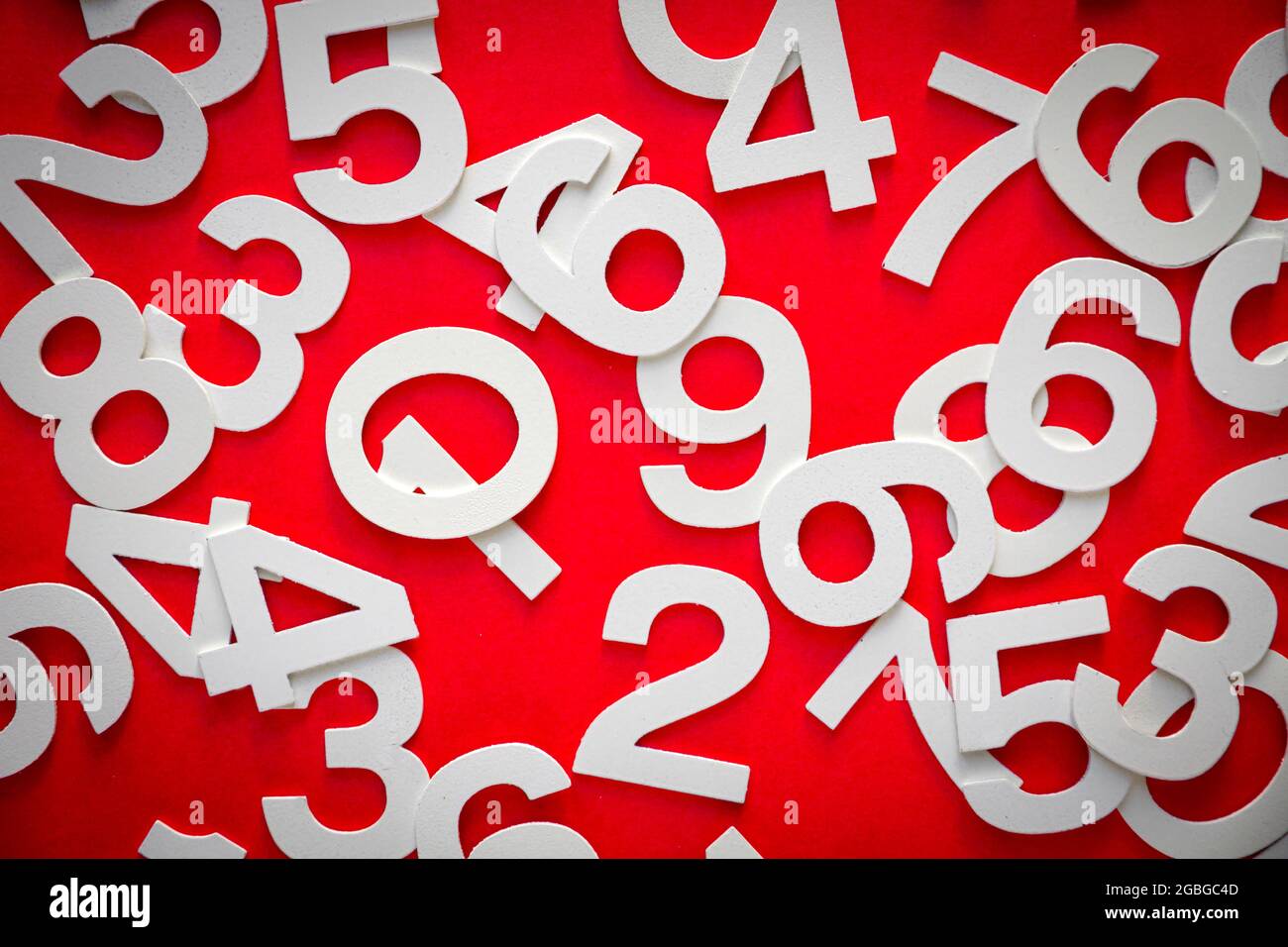 Mathematics background made with solid numbers on a board. Top view ...