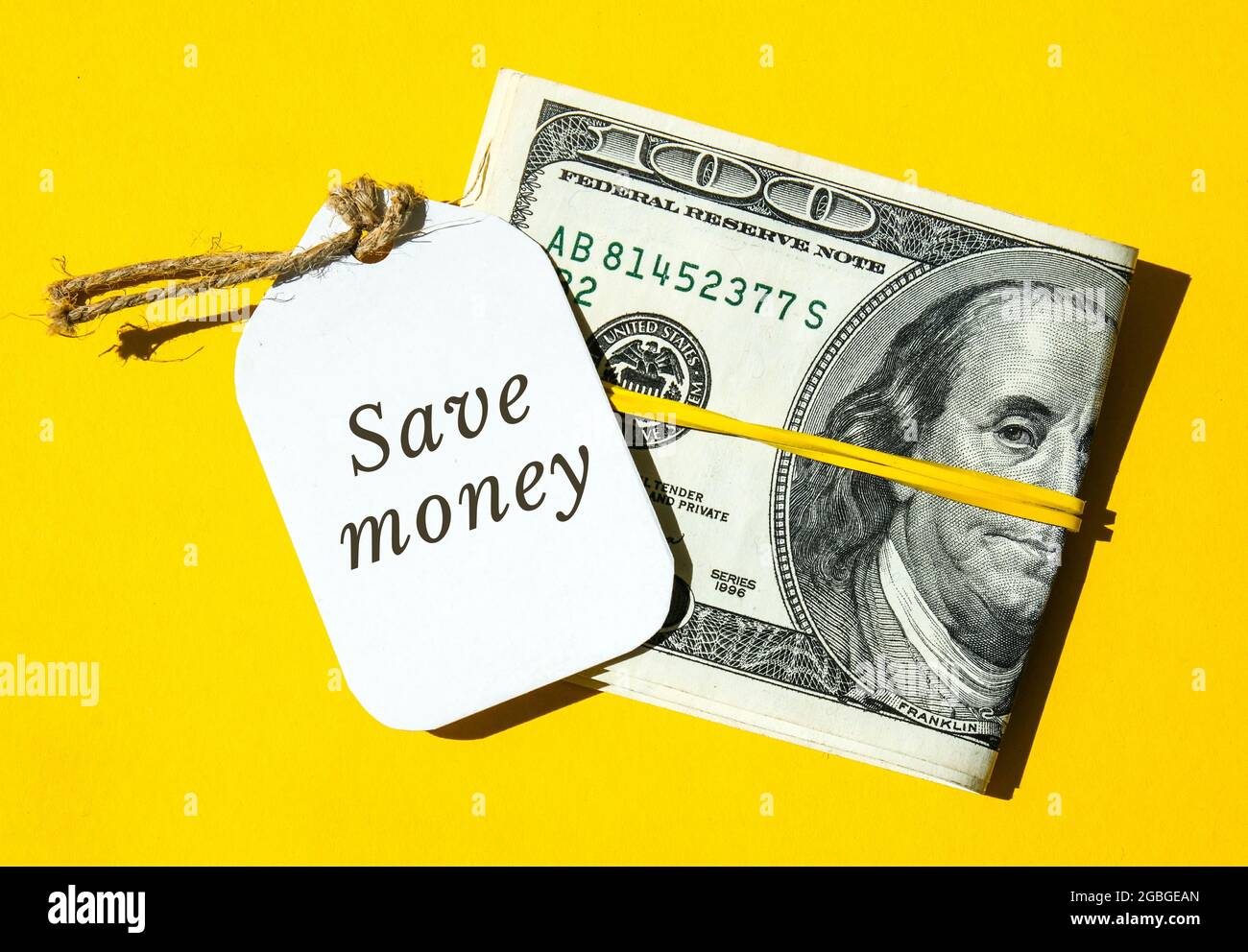 Paper note written text SAVINGS. Save money. Save today for tomorrow ...