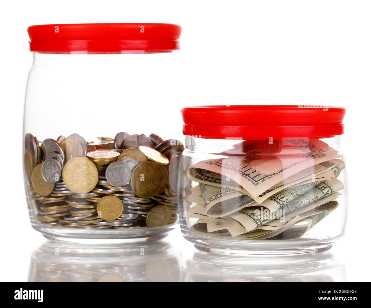 Clear glass jars for tips with money isolated on white Stock Photo - Alamy
