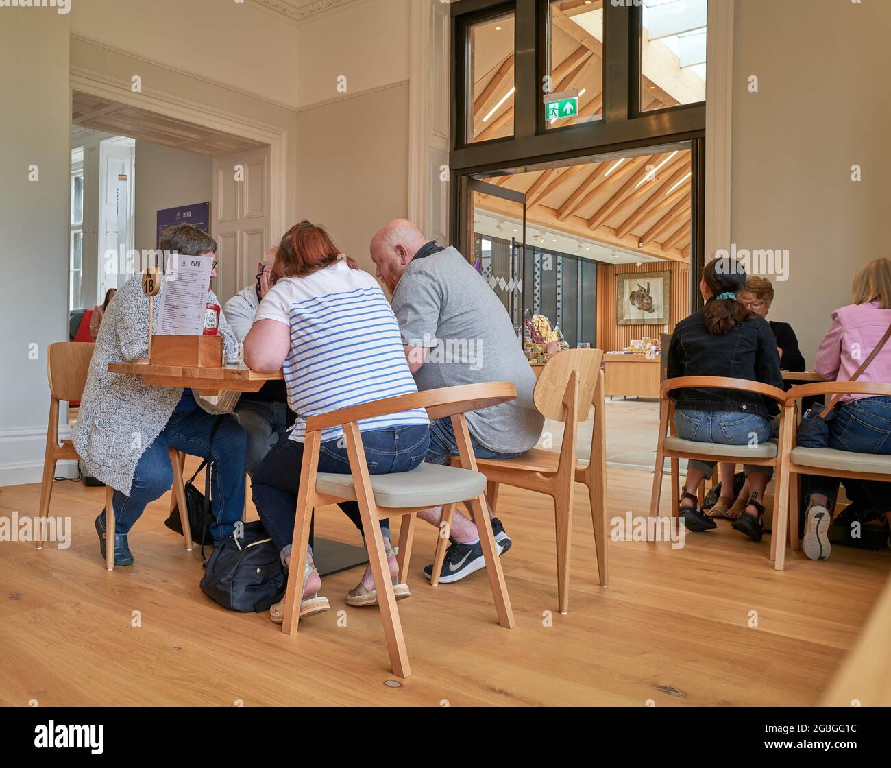 Socially distance groups in the café at the cathedral of Lincoln ...