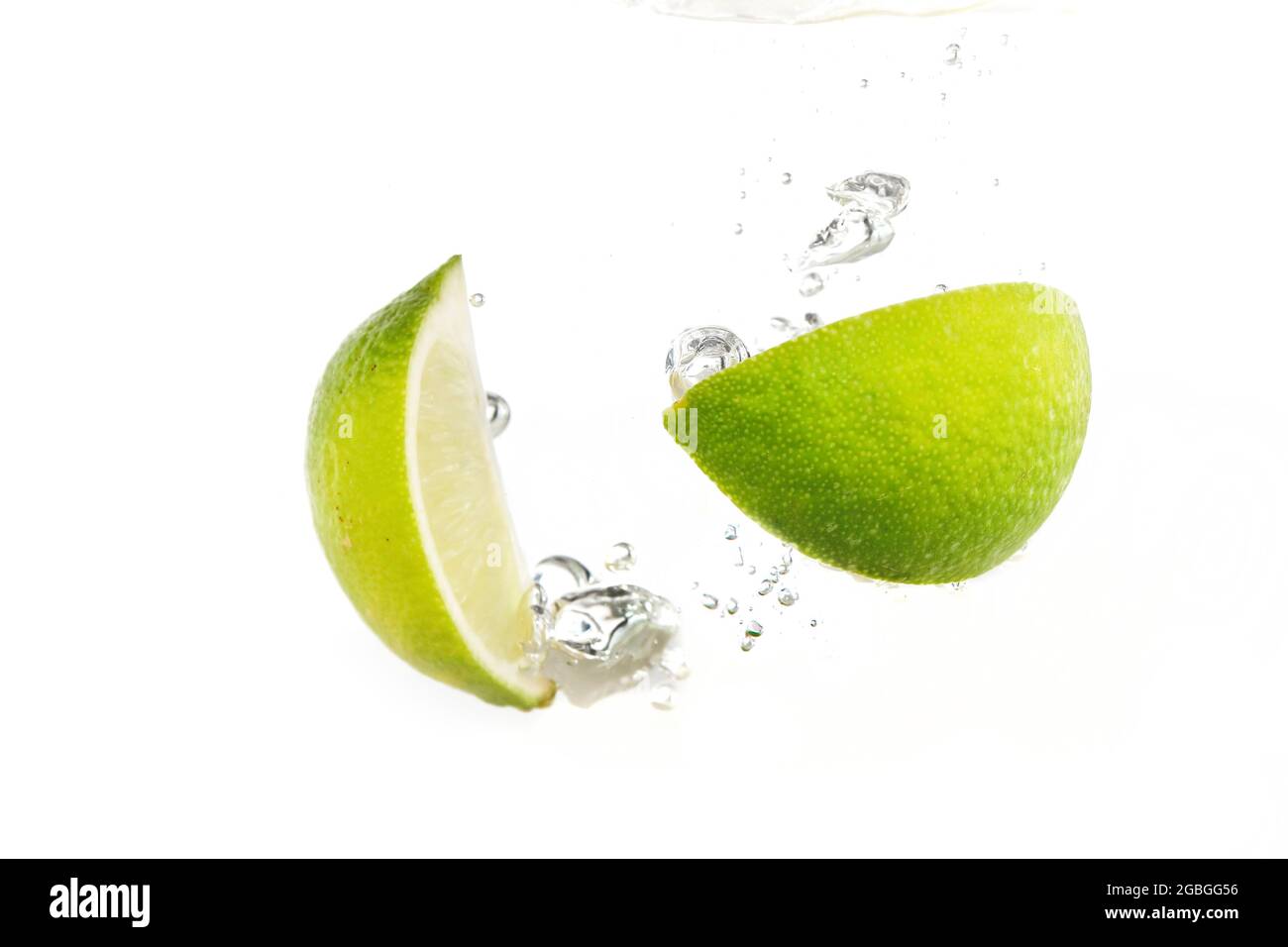 lime and lemon splashing water isolated on white background Stock Photo ...