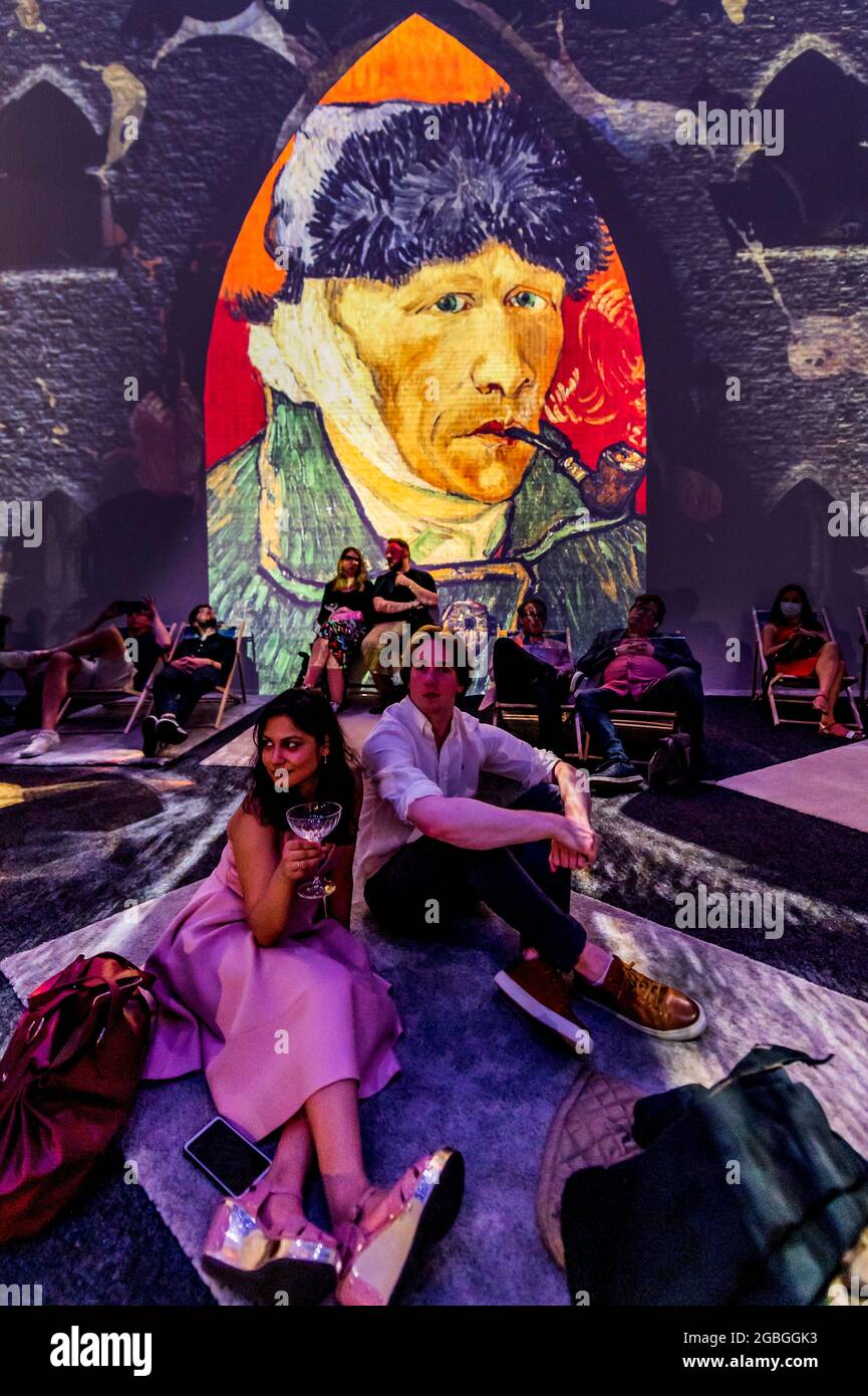 London, UK. 3rd Aug, 2021. The main room with a rolling projection of ...