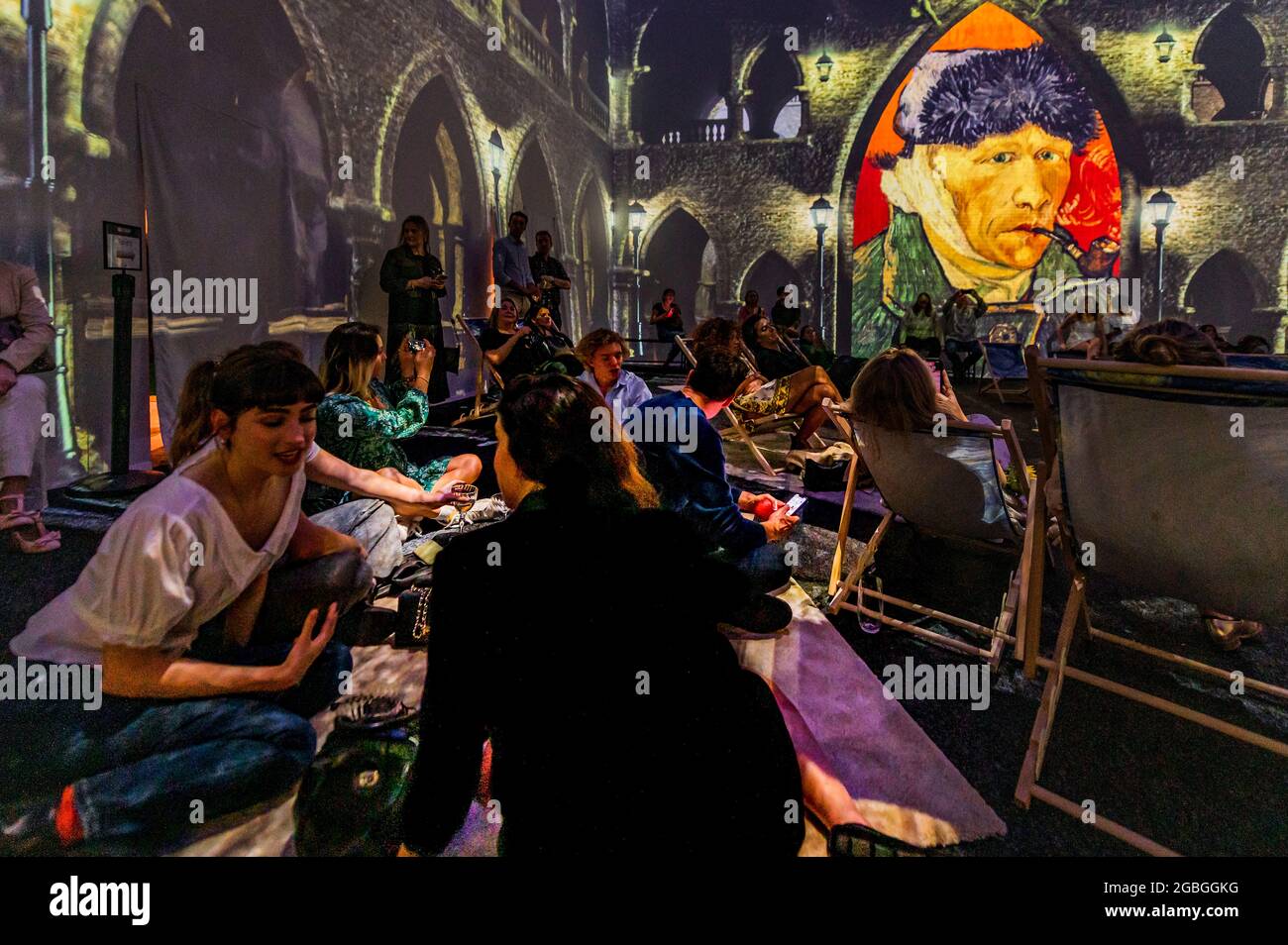 London, UK. 3rd Aug, 2021. The main room with a rolling projection of ...