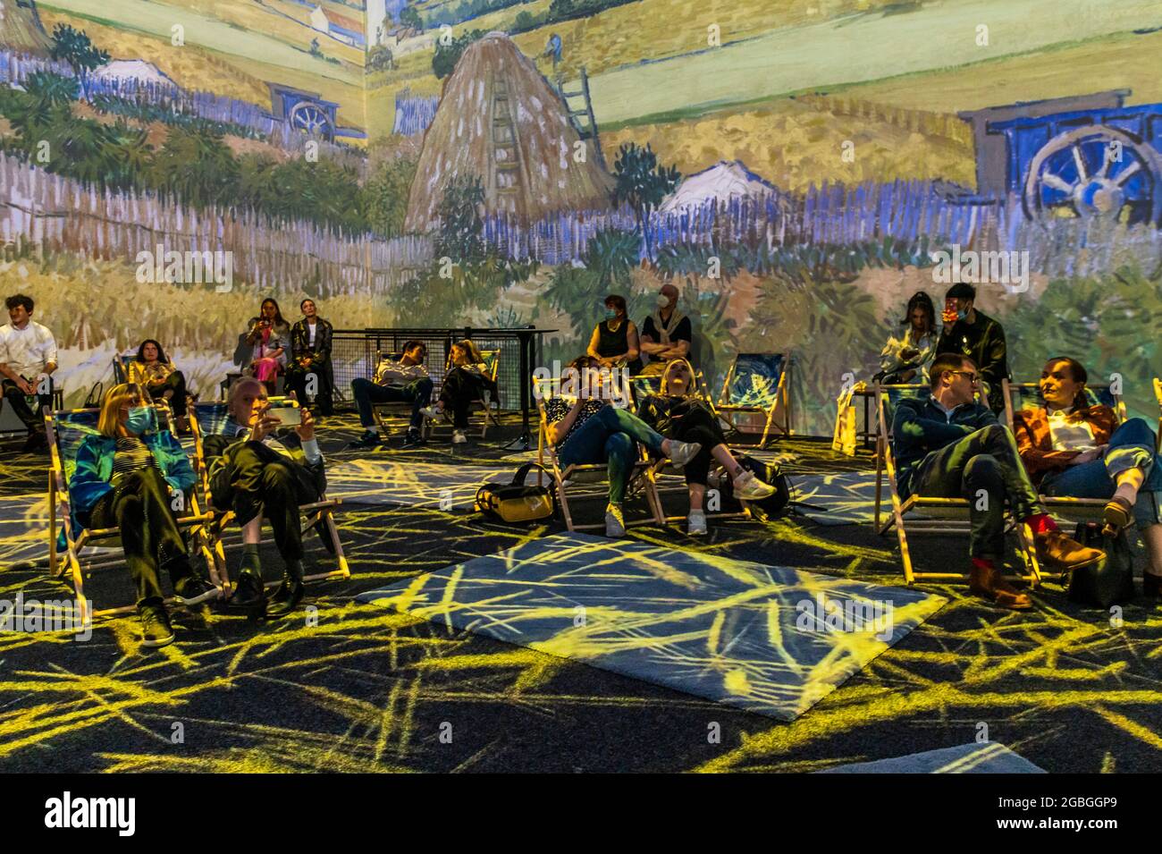 London, UK. 3rd Aug, 2021. The main room with a rolling projection of ...