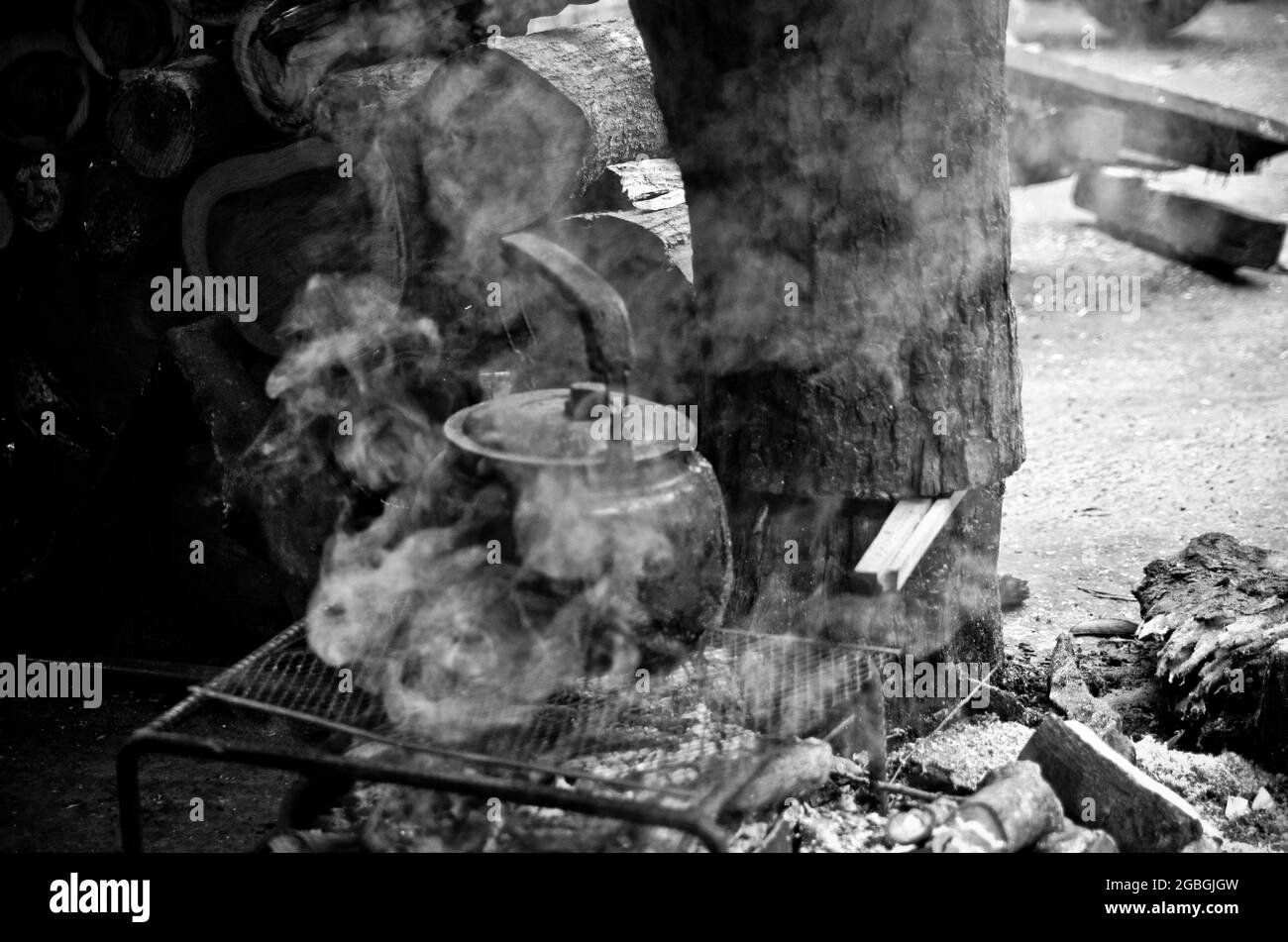 Boiling water with a kettle on the fire at an outdoor yard Stock Photo ...