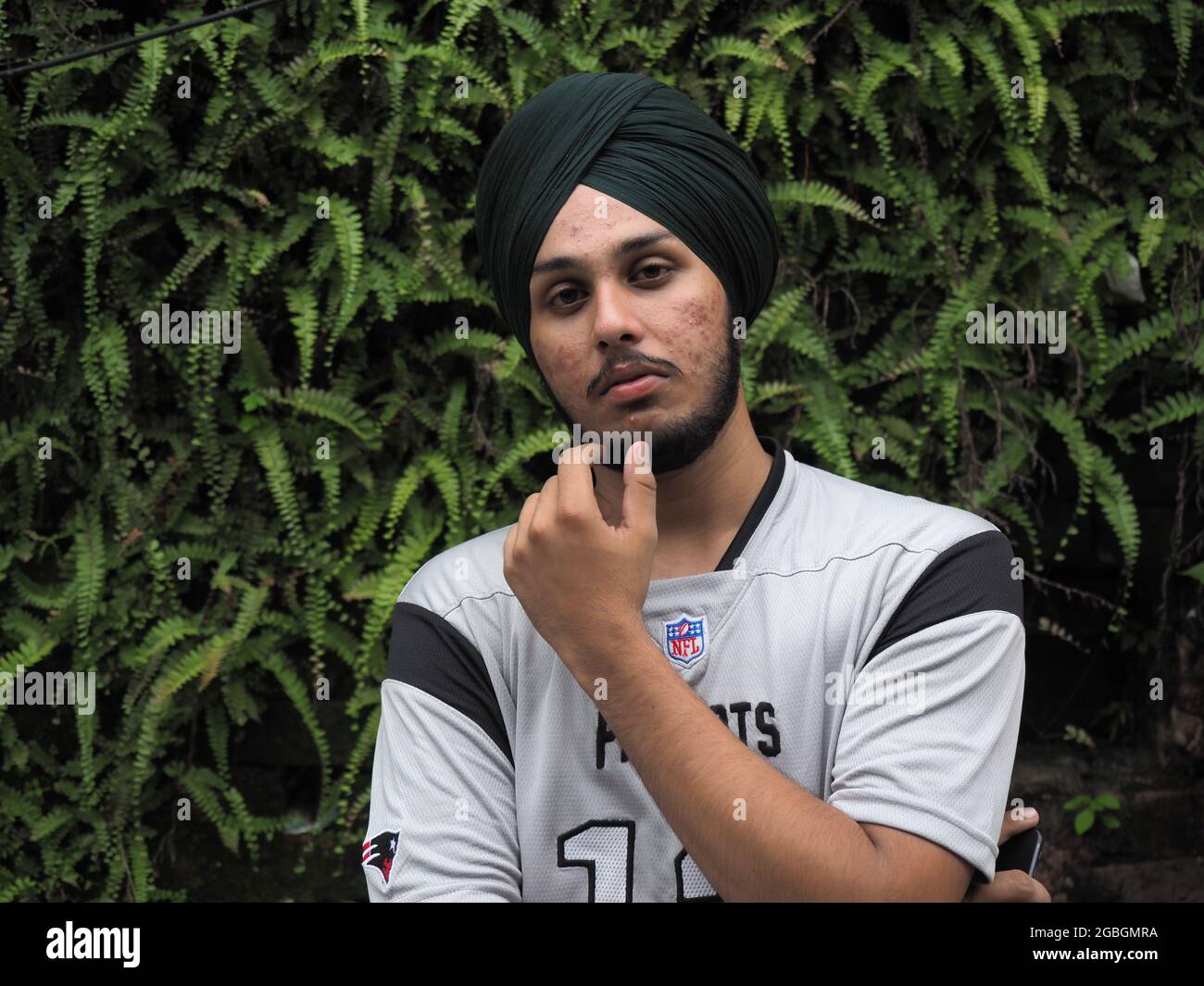 Portrait of sikh boy hi-res stock photography and images - Alamy