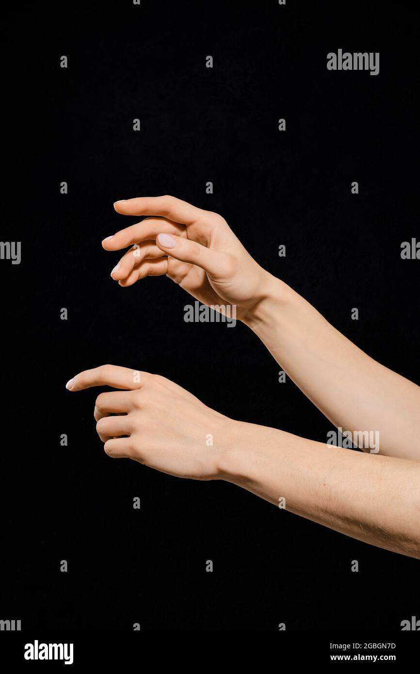 Woman hands showing different gestures over dark background (photo with ...