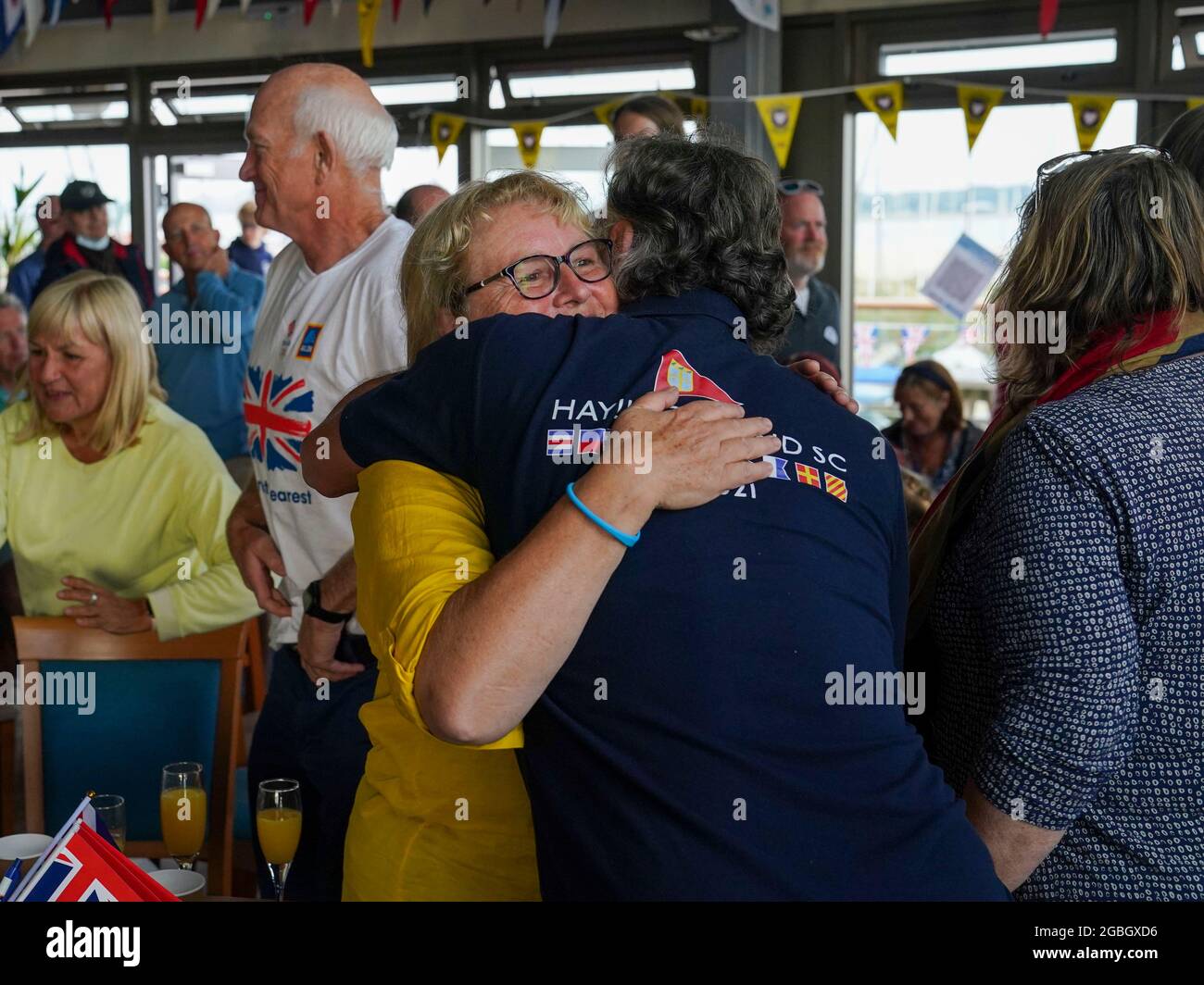 Caroline McIntyre (left), mother of Olympic gold medalist Eilidh ...