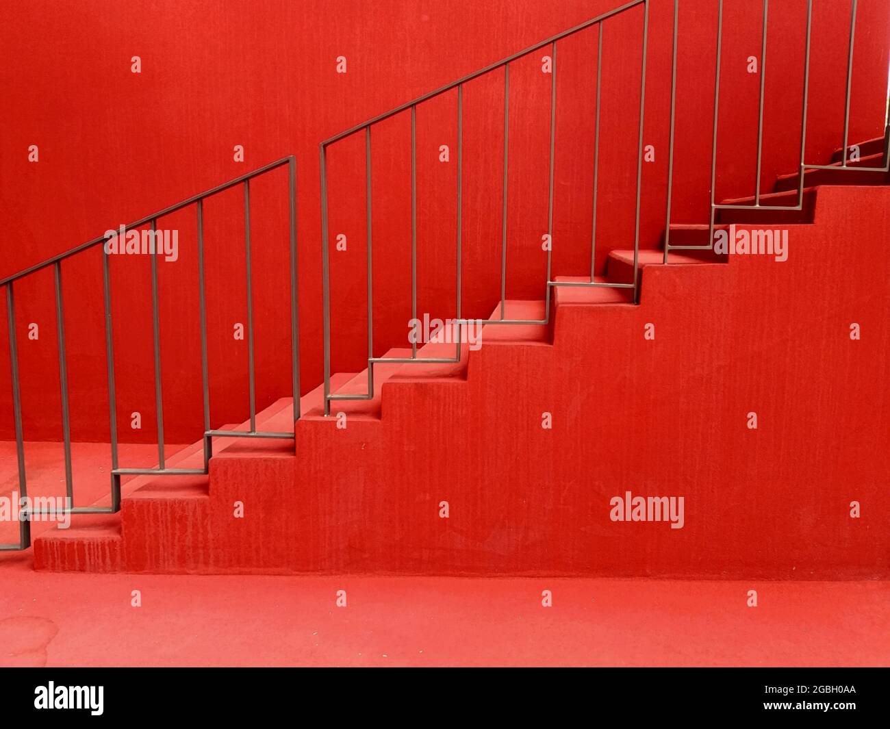 Closeup of red stairs with railings Stock Photo - Alamy