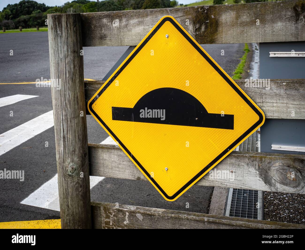 Road bump sign (W14-4). New Zealand road signs Stock Photo - Alamy