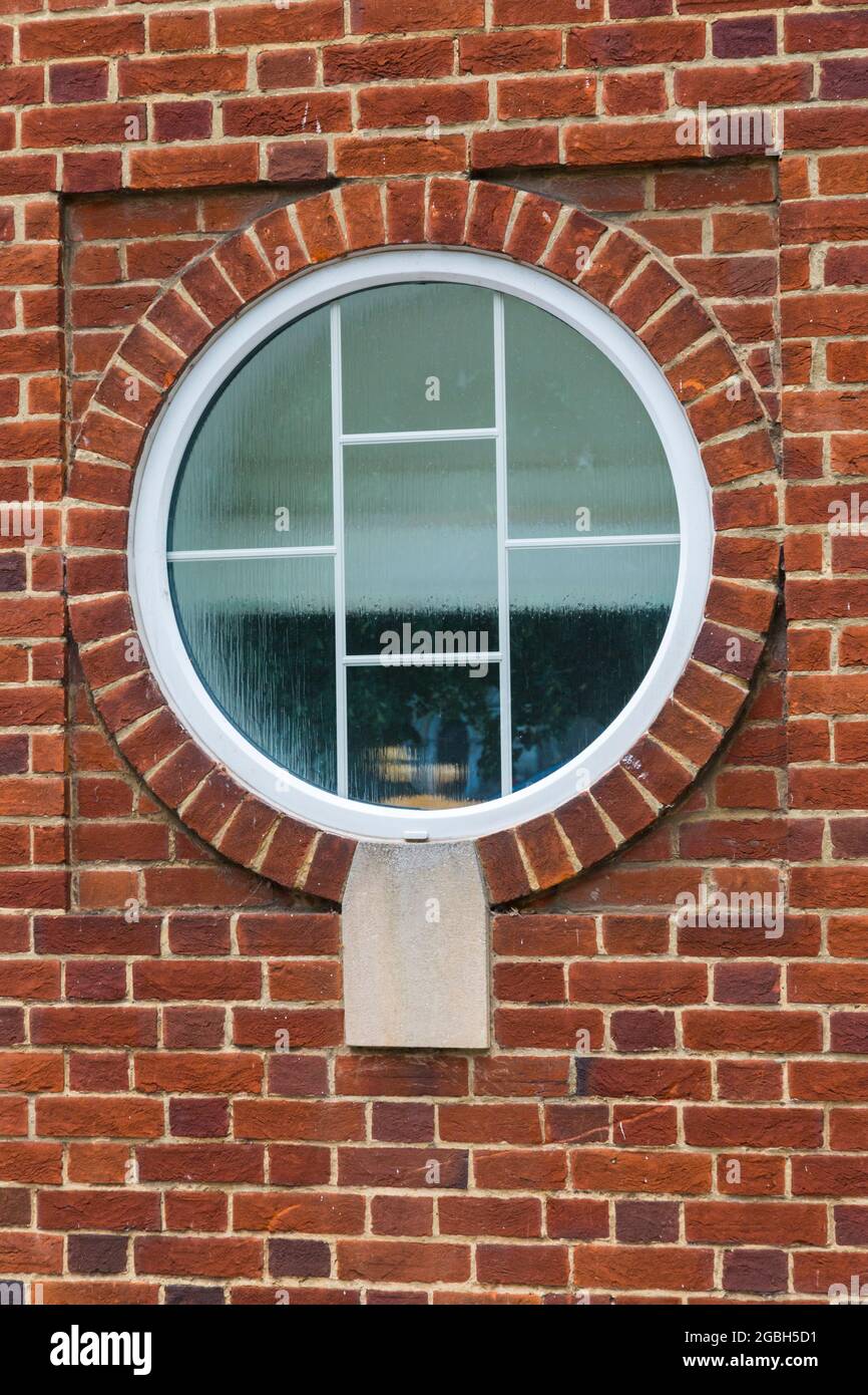 Round window in brick wall hi-res stock photography and images - Alamy