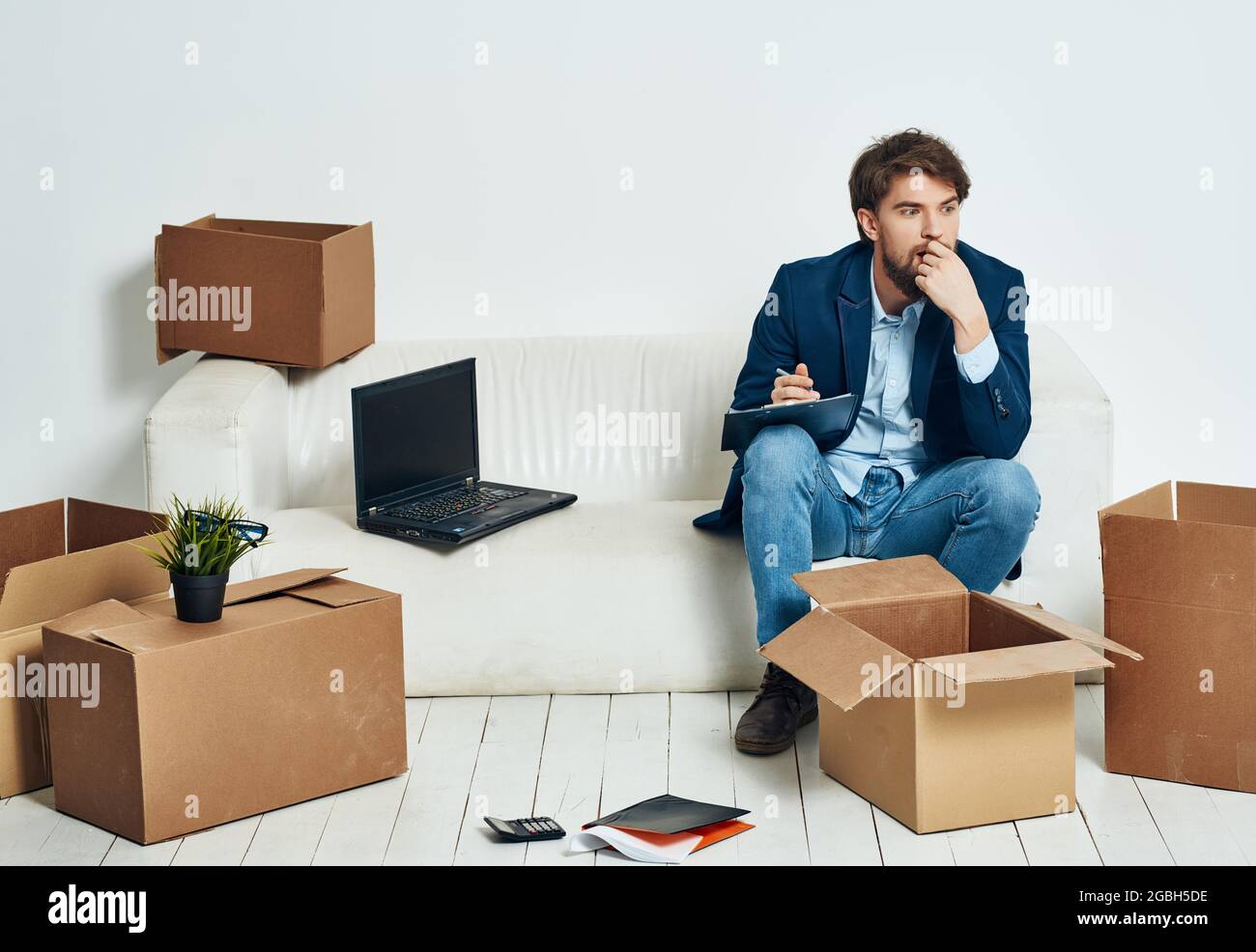 business man packing things office moving job is an official Stock ...