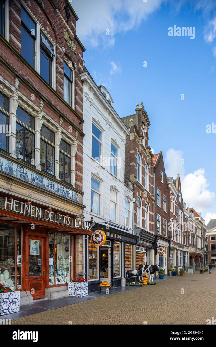 Delft Blue and cheese shop in historic building, market square Delft ...