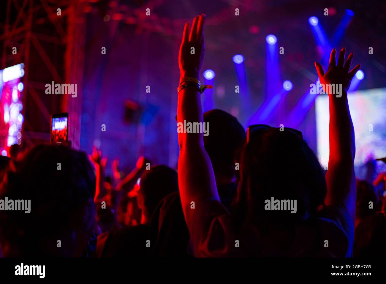 Crowd people dance dancing hands up hi-res stock photography and images ...