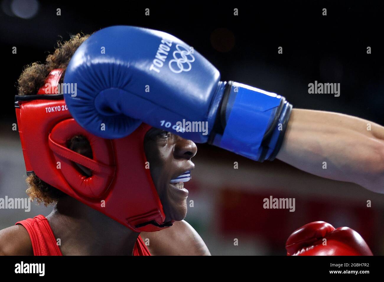 Tokyo, Japan. 4th Aug, 2021. Oshae Jones (red) of the United States ...