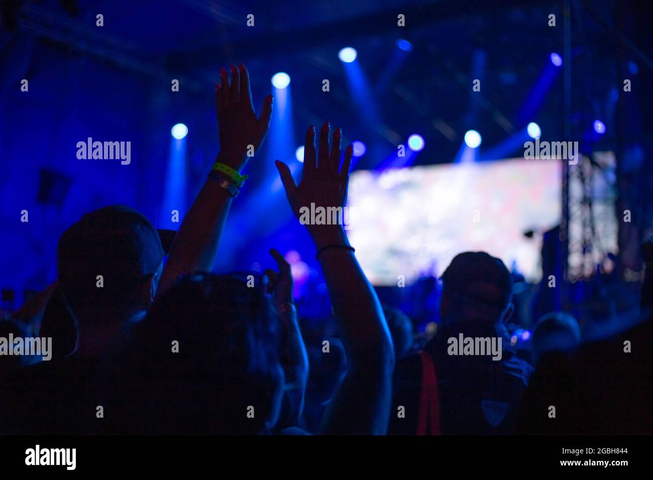 Raising hands nightclub hi-res stock photography and images - Alamy