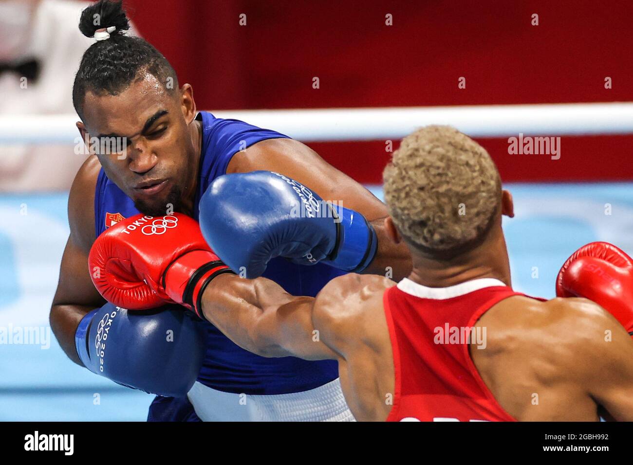 Tokyo, Japan. 4th Aug, 2021. Arlen Lopez (L) of Cuba competes with ...
