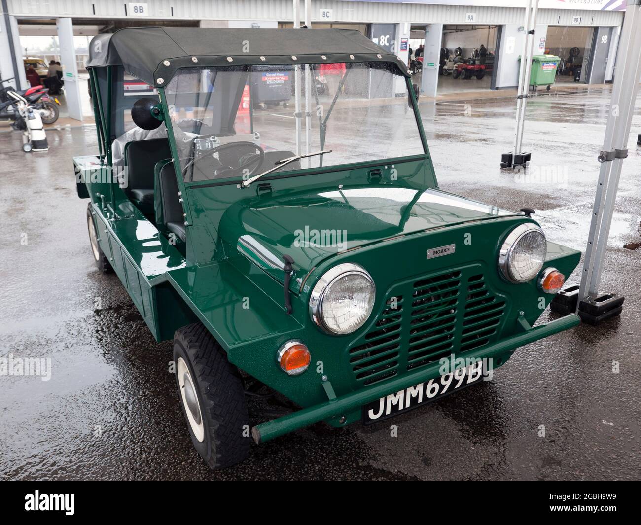 Three-Quarter Front view of a Green, 1964, Morris Mini Moke, undercover ...