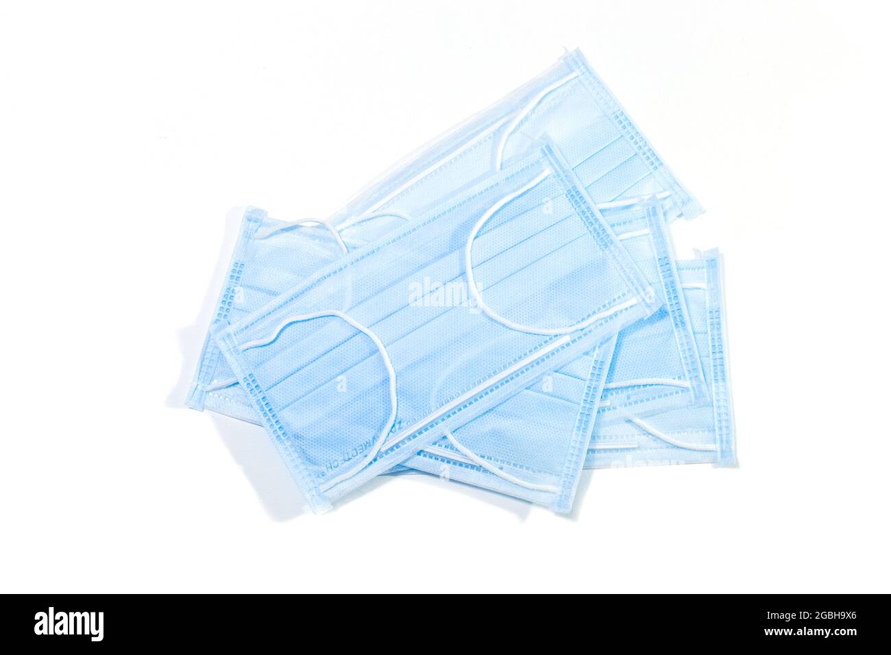 medical masks of blue color, isolated background, means of protection ...