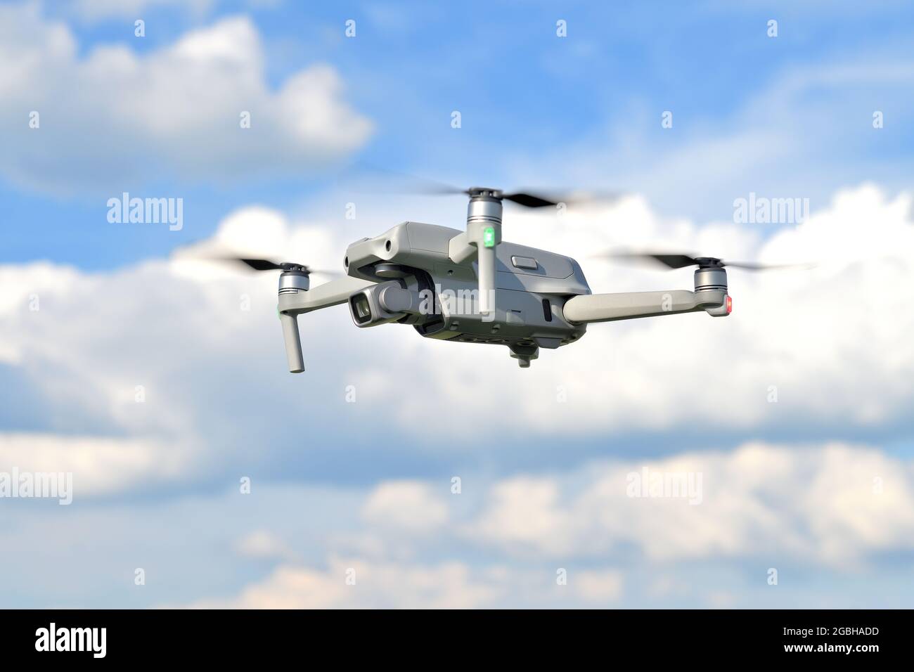 UAV drone copter flying with digital camera. View of a photography ...