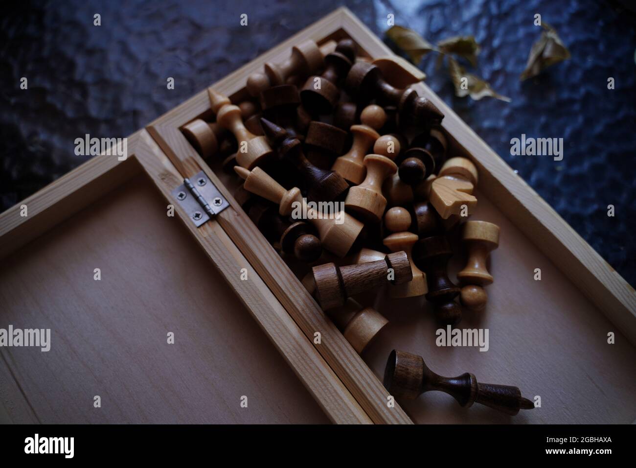 Close up of wooden chess pieces in checkerboard. Concept of board game ...