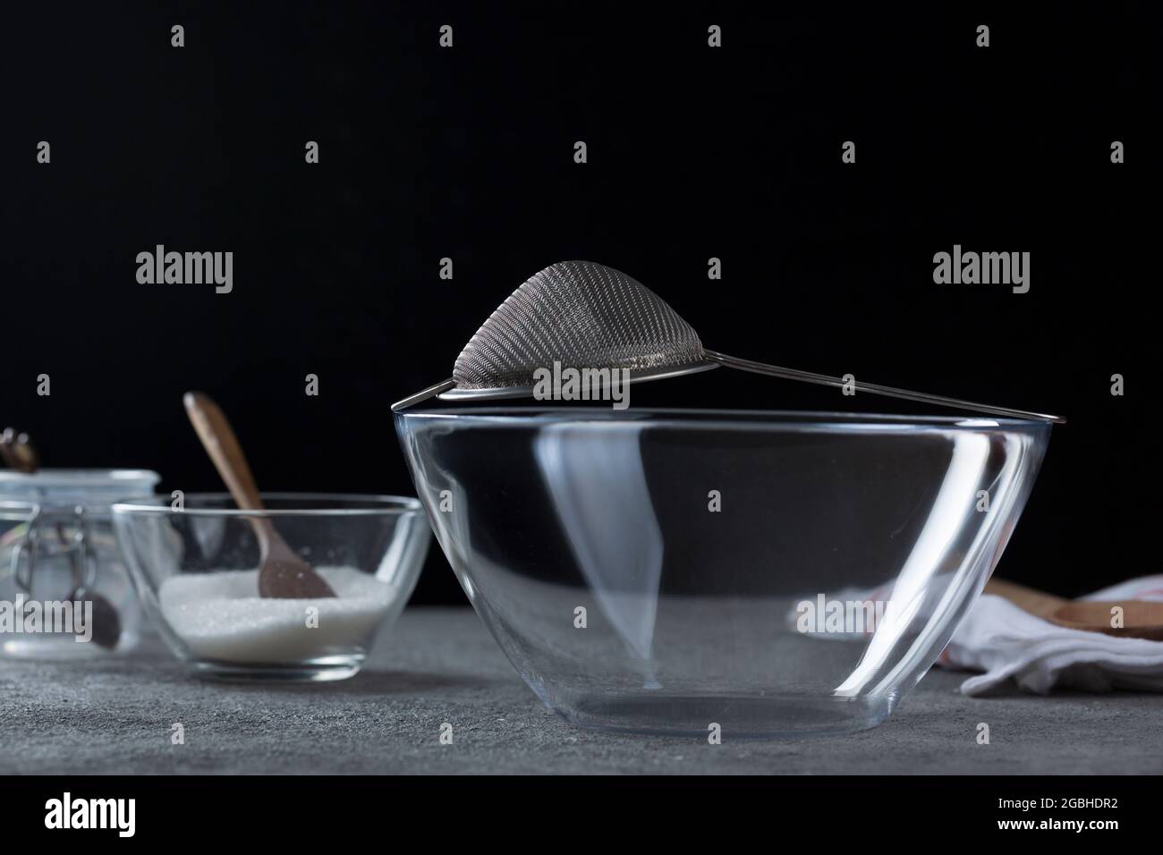 Empty transparent bowl and dishes on the kitchen table. Close-up Stock ...