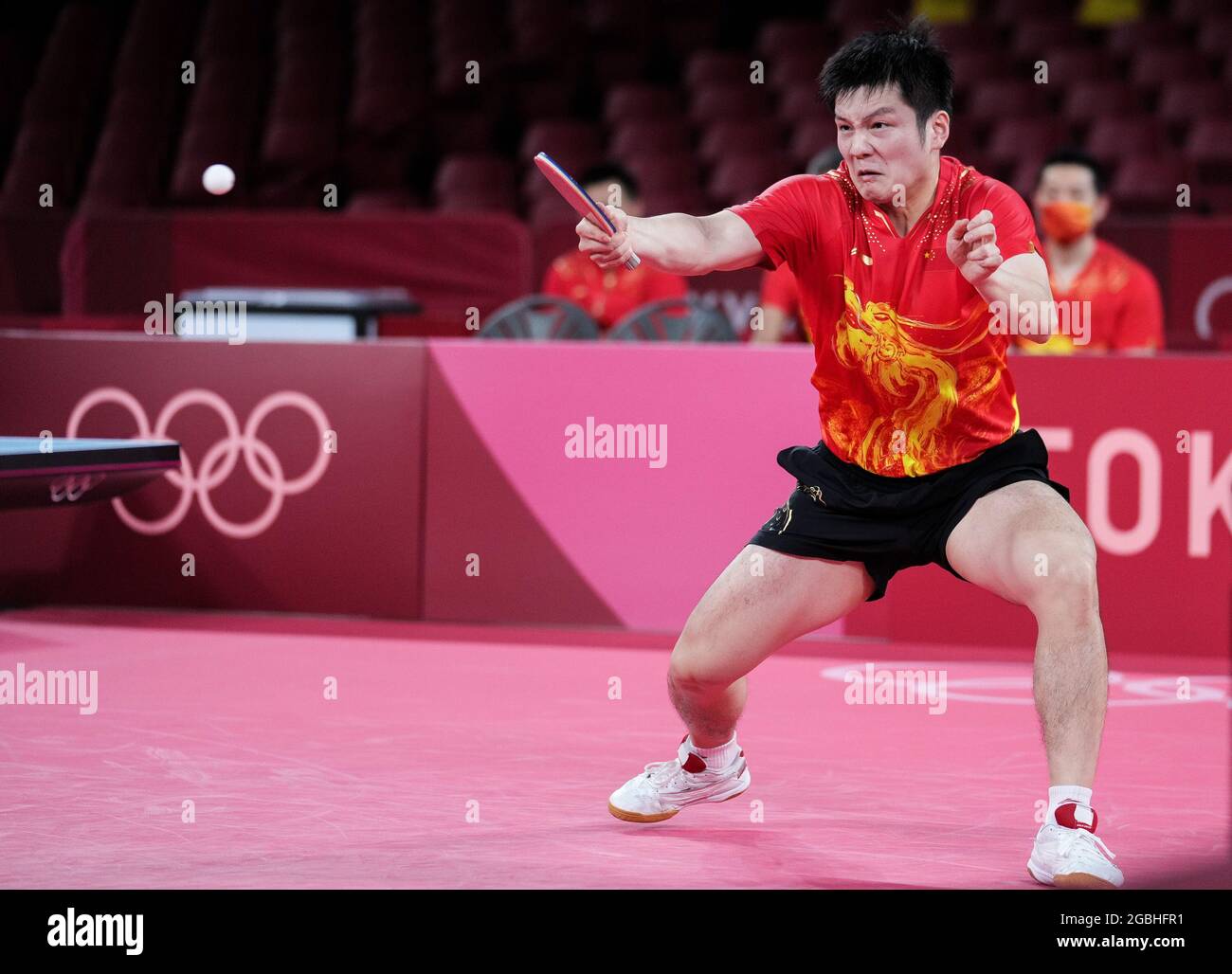 Tokyo, Japan. 4th Aug, 2021. Fan Zhendong of China hits a return during the table tennis men's ...