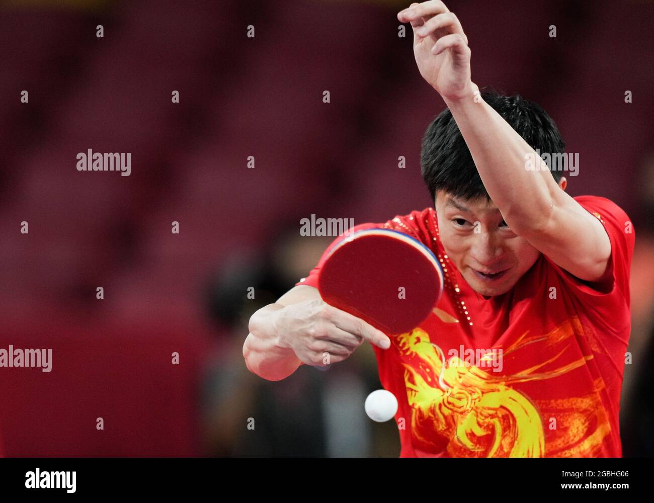 Tokyo, Japan. 4th Aug, 2021. Ma Long of China hits a return during the ...