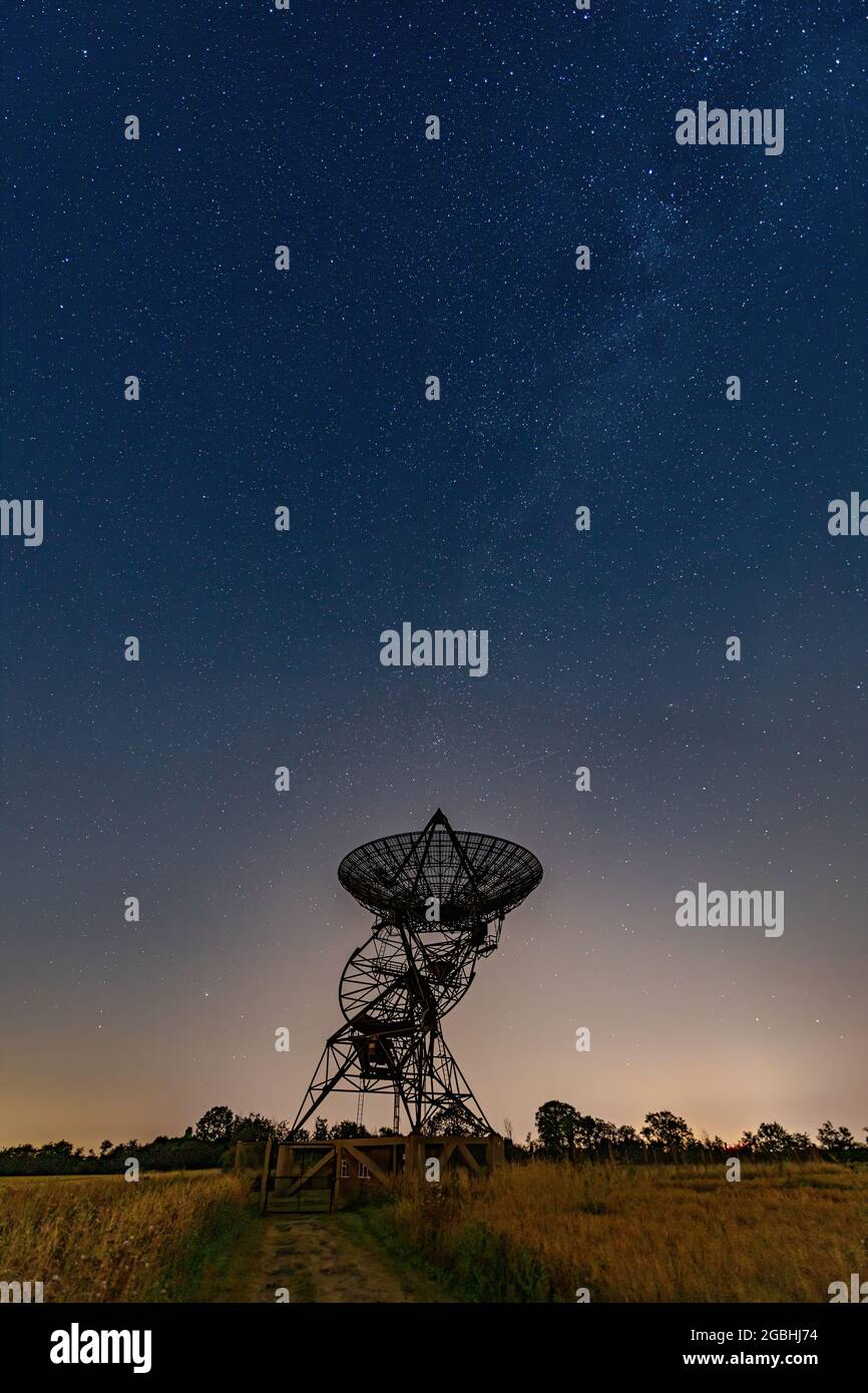 Eerie scenery of a radio telescope on a starry night Stock Photo - Alamy