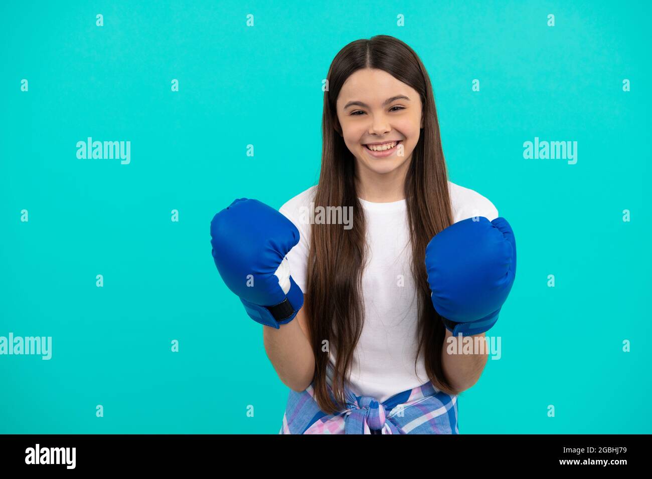 successful child boxer in boxing gloves during sport training, copy ...