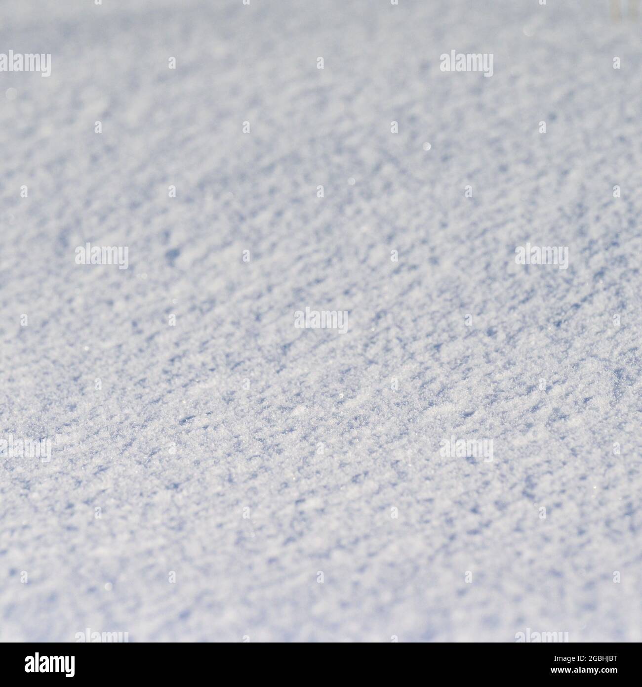 Winter snow background, ice crystals sparkling on snow, christmas ...