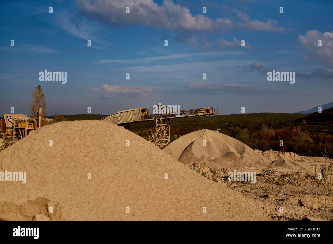 mountains of sand building materials geology Stock Photo - Alamy