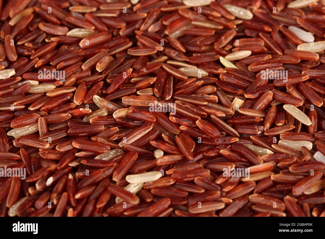 Background red rice Stock Photo - Alamy