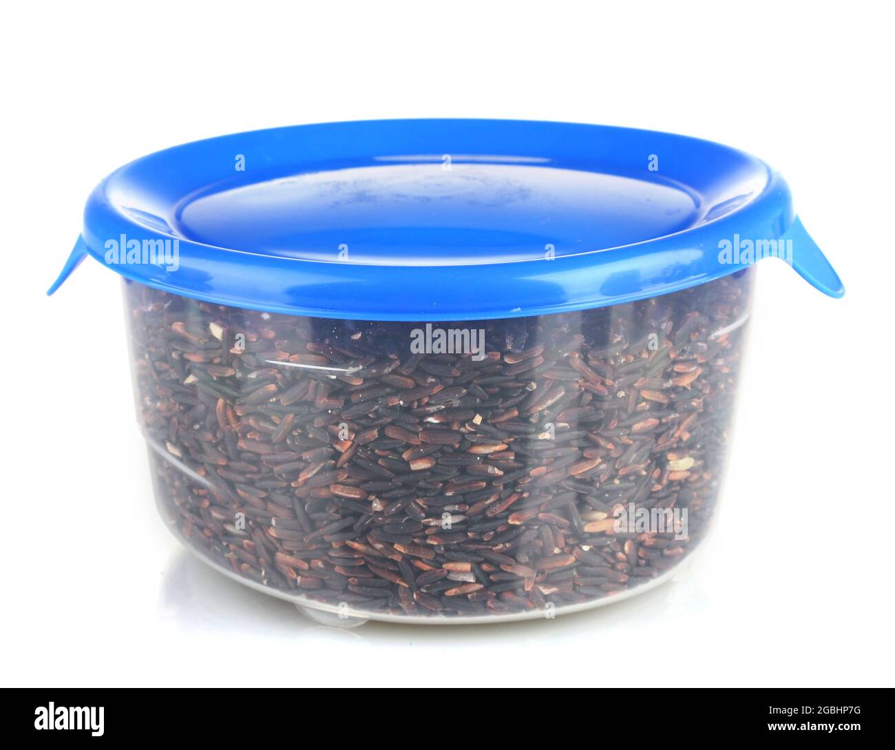 black rice in jar on white background Stock Photo - Alamy