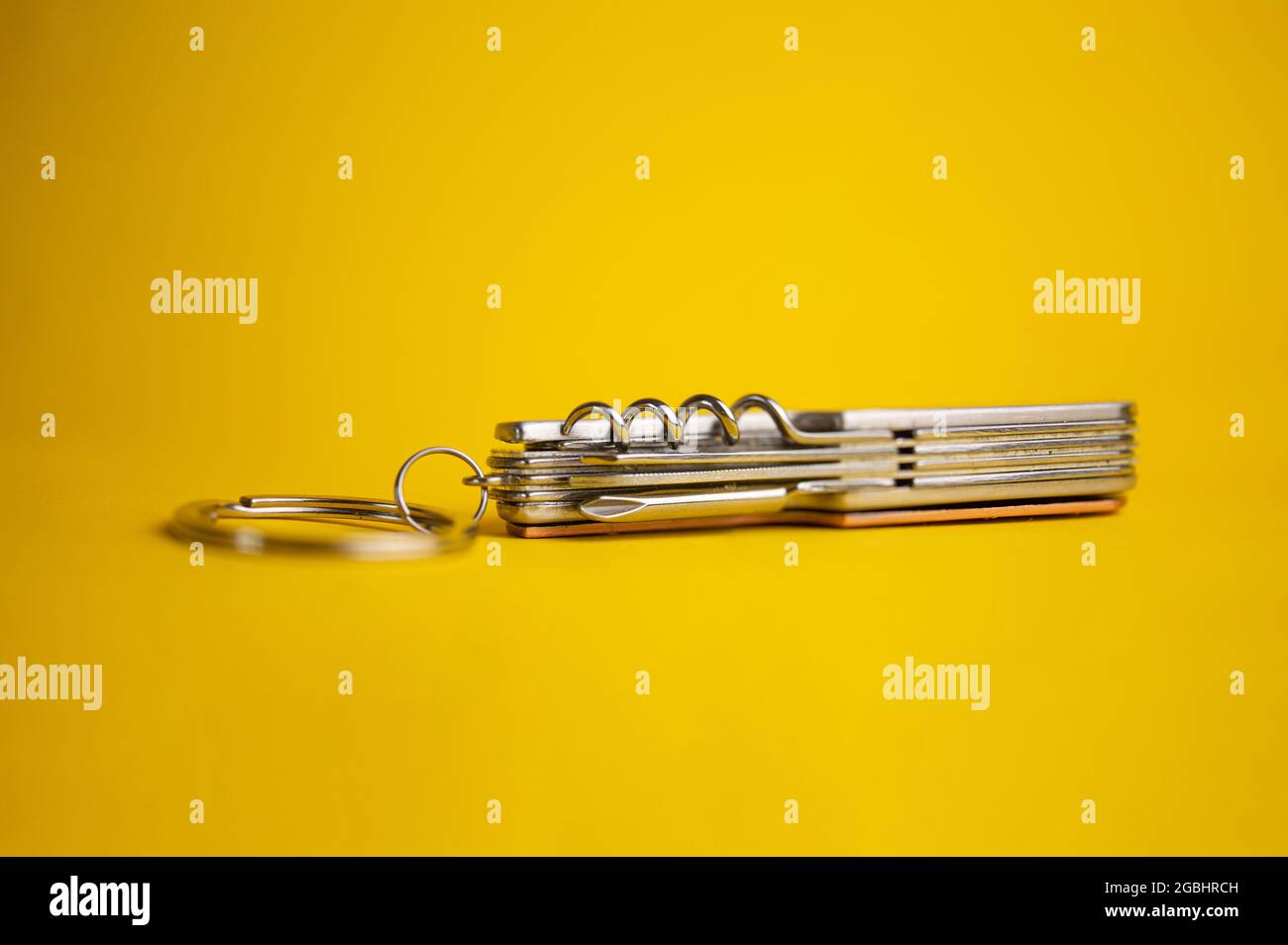 Yellow penknife handle hi-res stock photography and images - Alamy