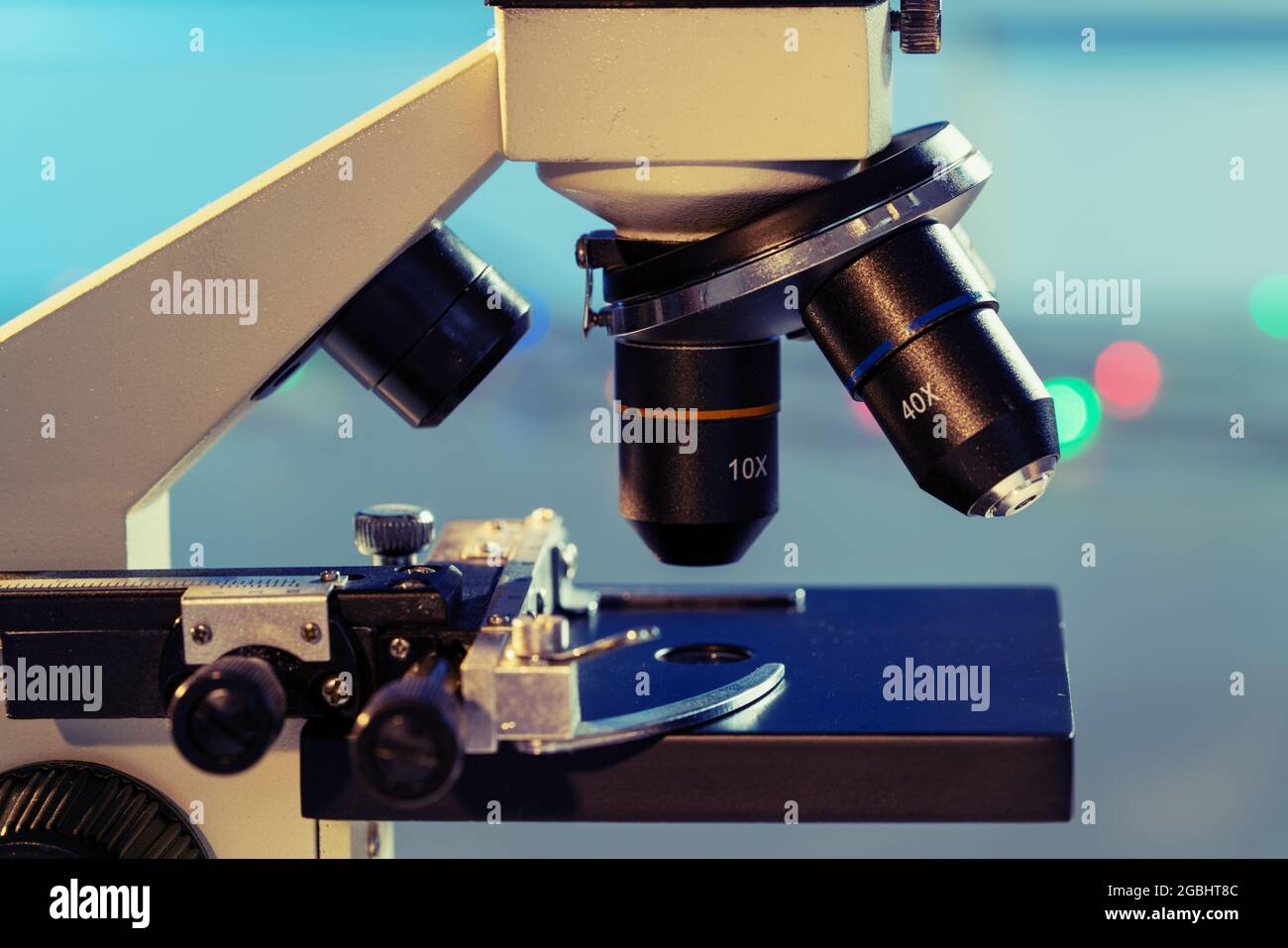 Microscope and model of chemical molecule in school class Stock Photo ...