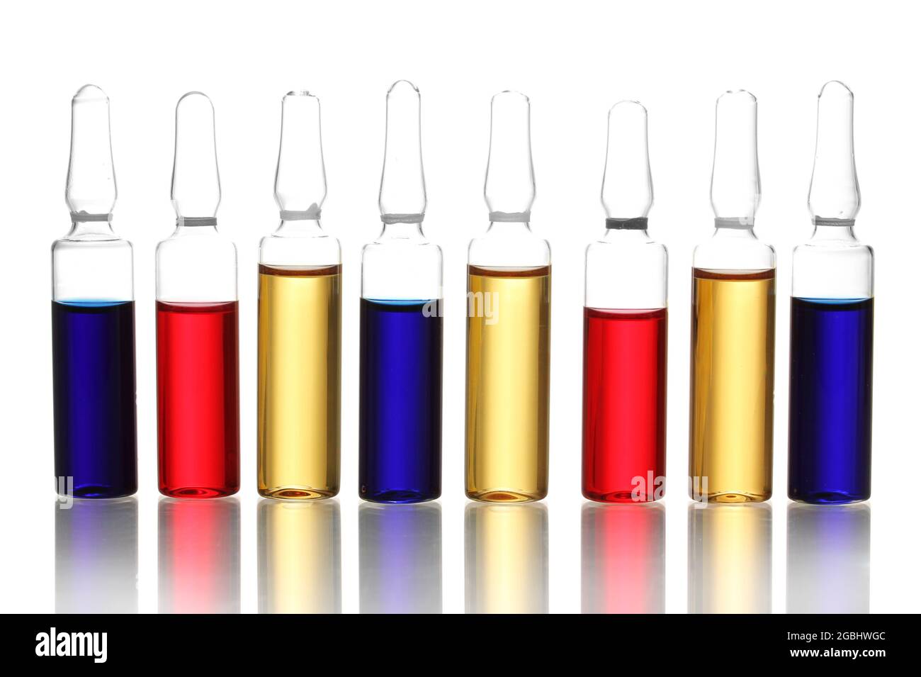 medical ampules with bright liquid, isolated on white Stock Photo - Alamy