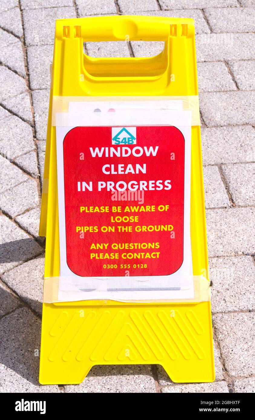 'Window clean in progress' sign by S4B housing, on a pavement in ...